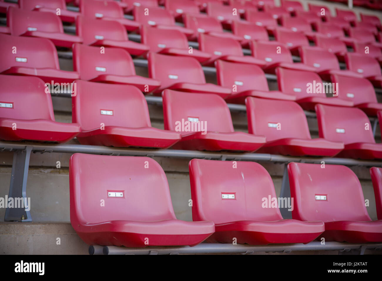 Empty seats in stadium Stock Photo - Alamy
