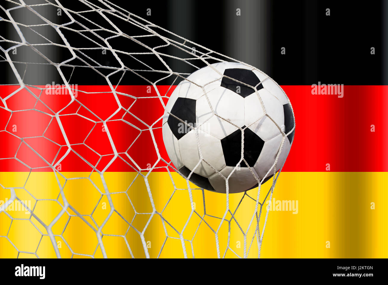 Soccer ball on a German flag Stock Photo - Alamy
