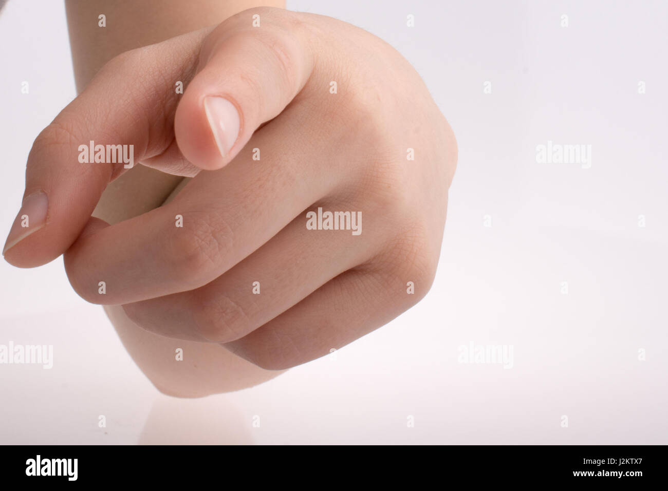 Hand pointing gesture on a white background Stock Photo - Alamy