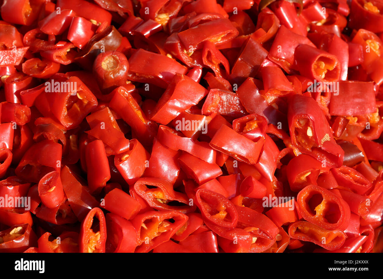 background of spicy red cutted peppers typical of the South Italian ...