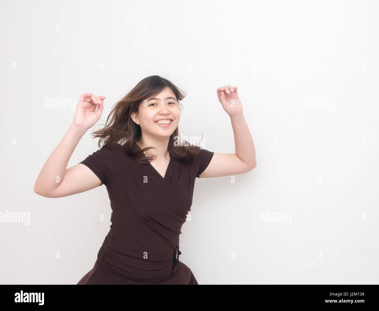 Attractive Asian Woman Jumping Stock Photo - Alamy