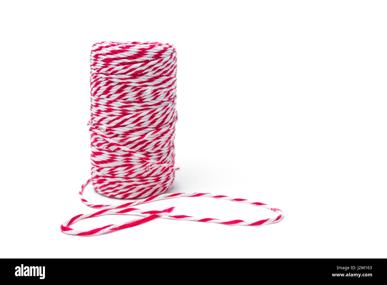 red and white rope roll isolated on white Stock Photo - Alamy