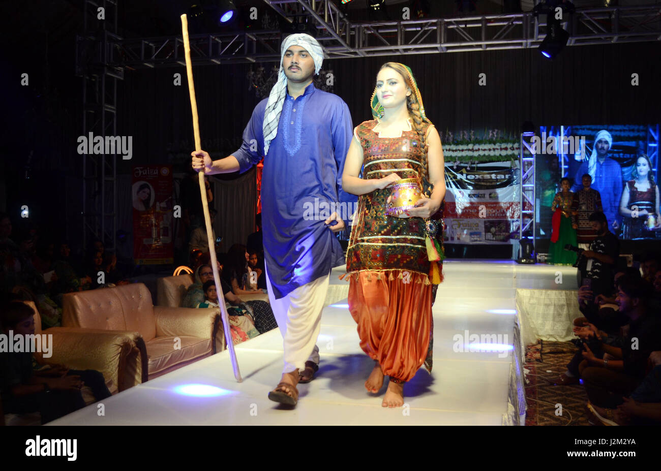 New models walk on the ramp during the fashion show organized by the ...