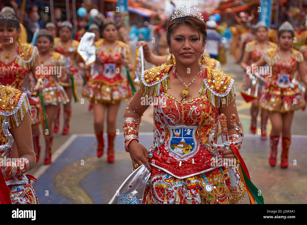 Diablada dancers in ornate costumes parade through the mining city of ...