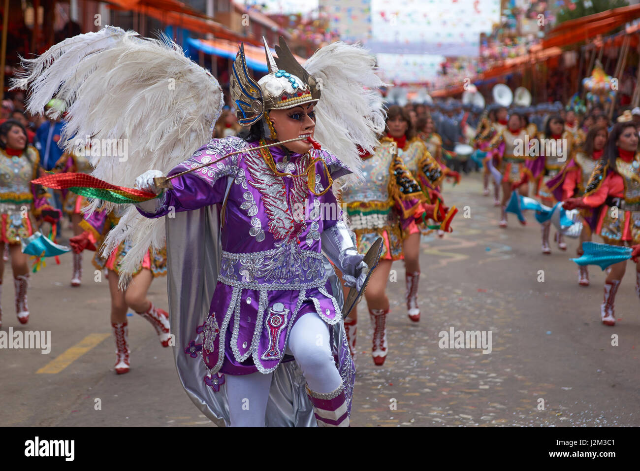 Diablada dancers in ornate costumes parade through the mining city of ...