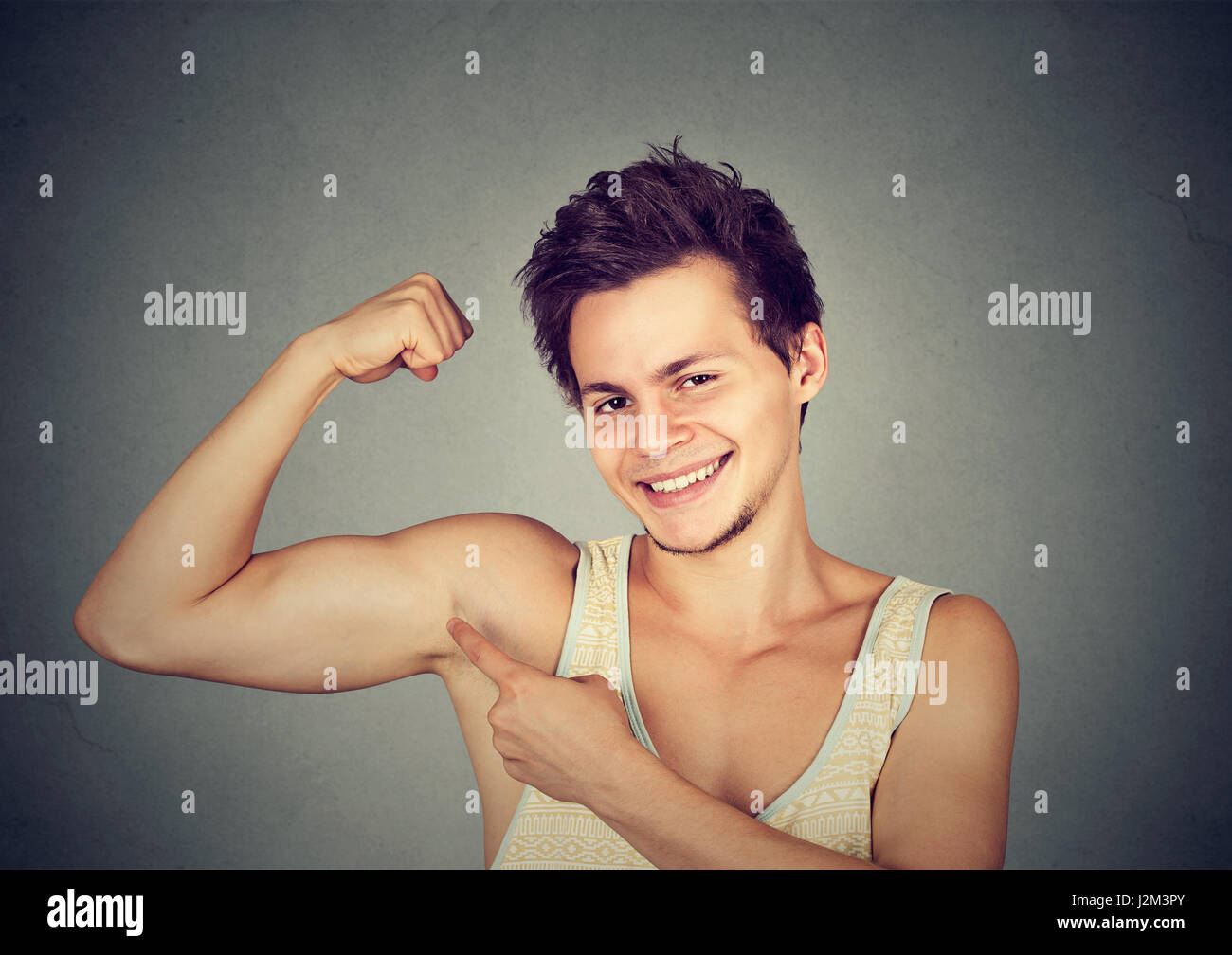 Teenager muscle flexing hi-res stock photography and images - Alamy