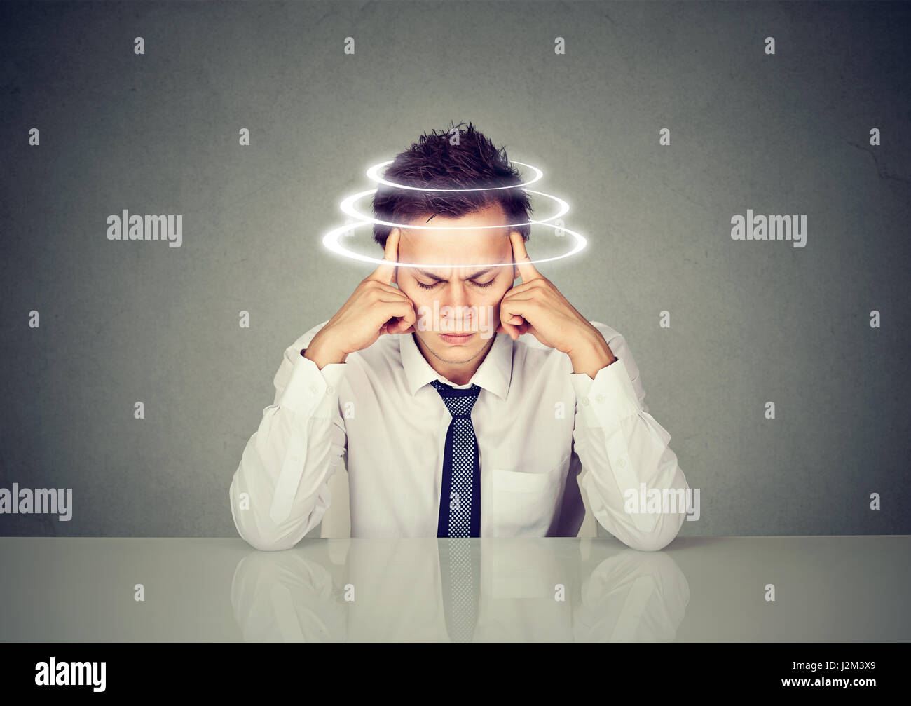 Man with vertigo. Young male patient suffering from dizziness Stock ...