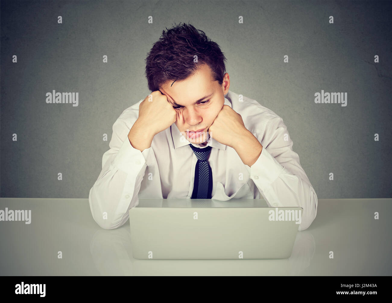 Guy sad in front of his computer hi-res stock photography and images ...