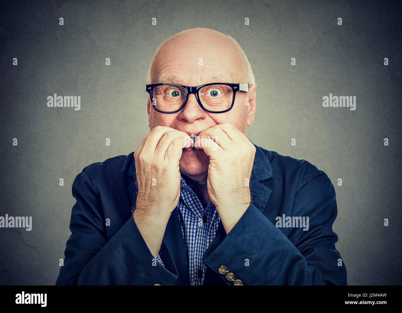 Anxious scared senior man biting fingernails Stock Photo - Alamy