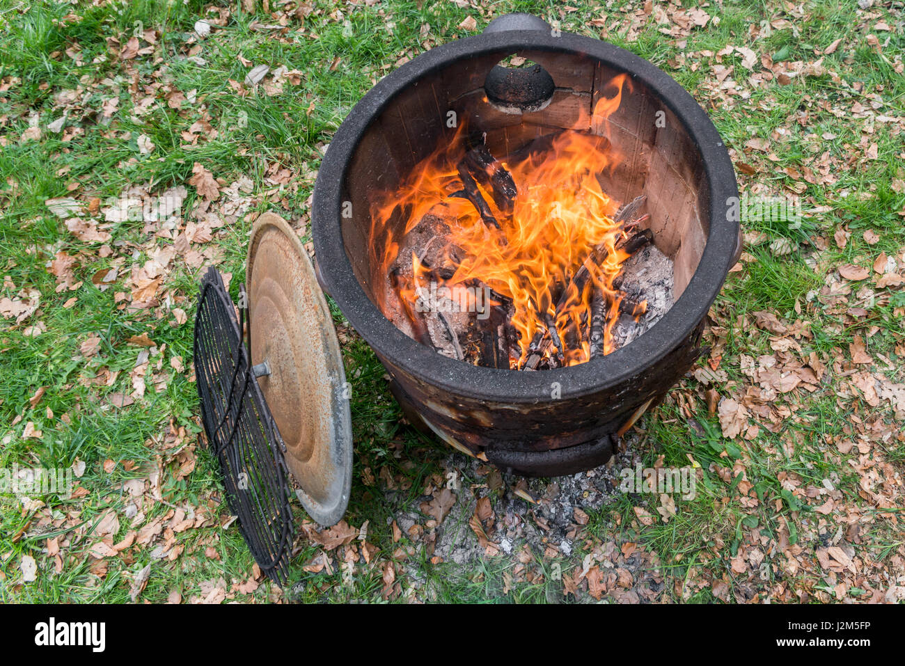 Burning fire in a fire pot Stock Photo - Alamy