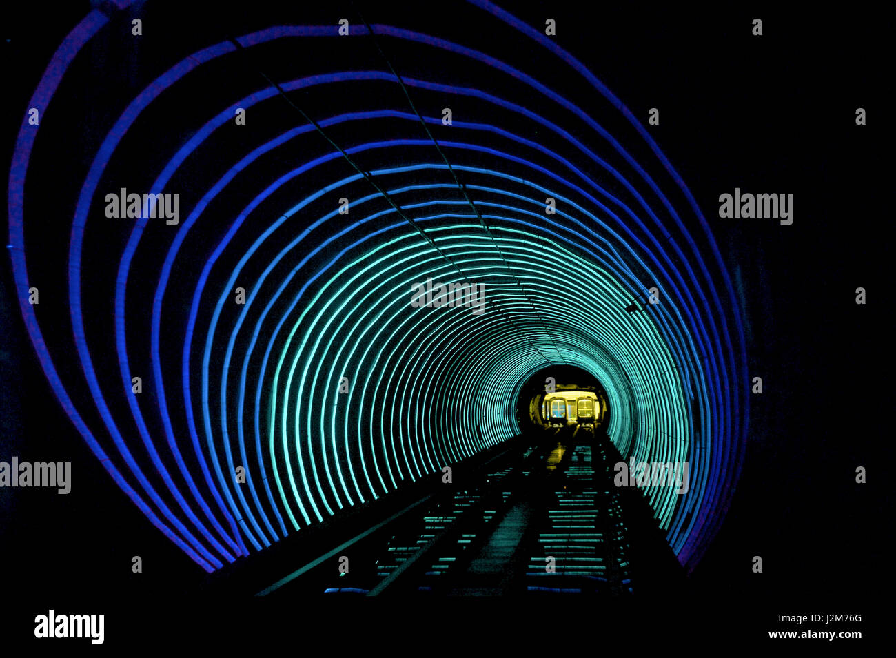 China, Shanghai, the Bund Tourist Tunnel: Passengers boarding a train ...