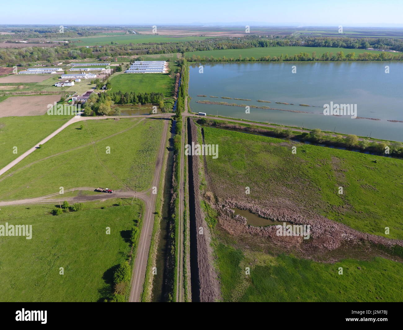 Rural landscape. View from above. On the horizon there is a fish ...