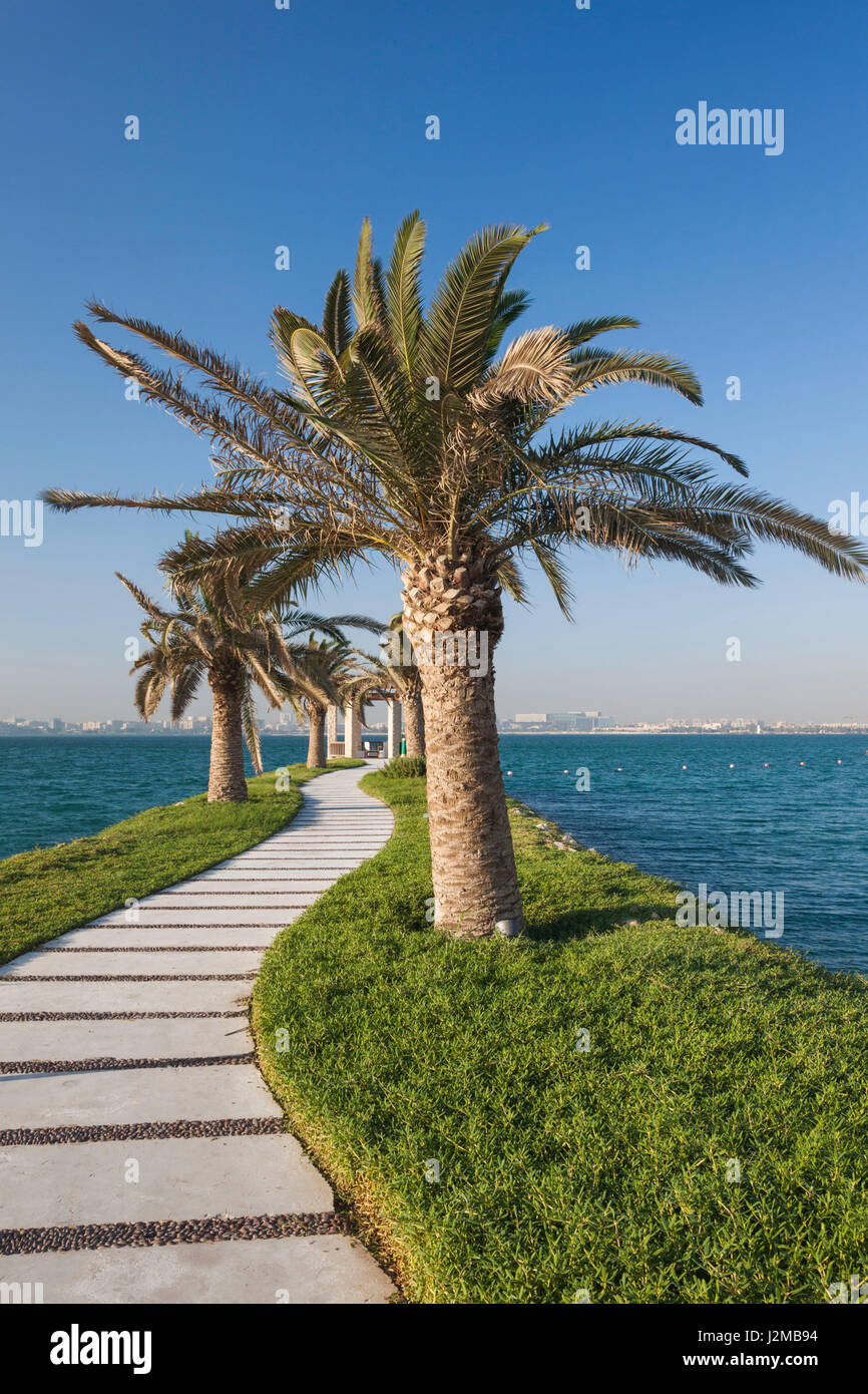 Qatar, Doha, West Bay walkway with palms Stock Photo - Alamy