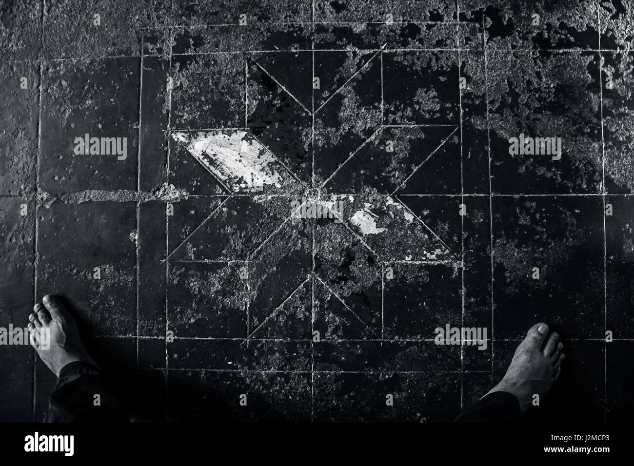 human legs on the rough floor Stock Photo - Alamy