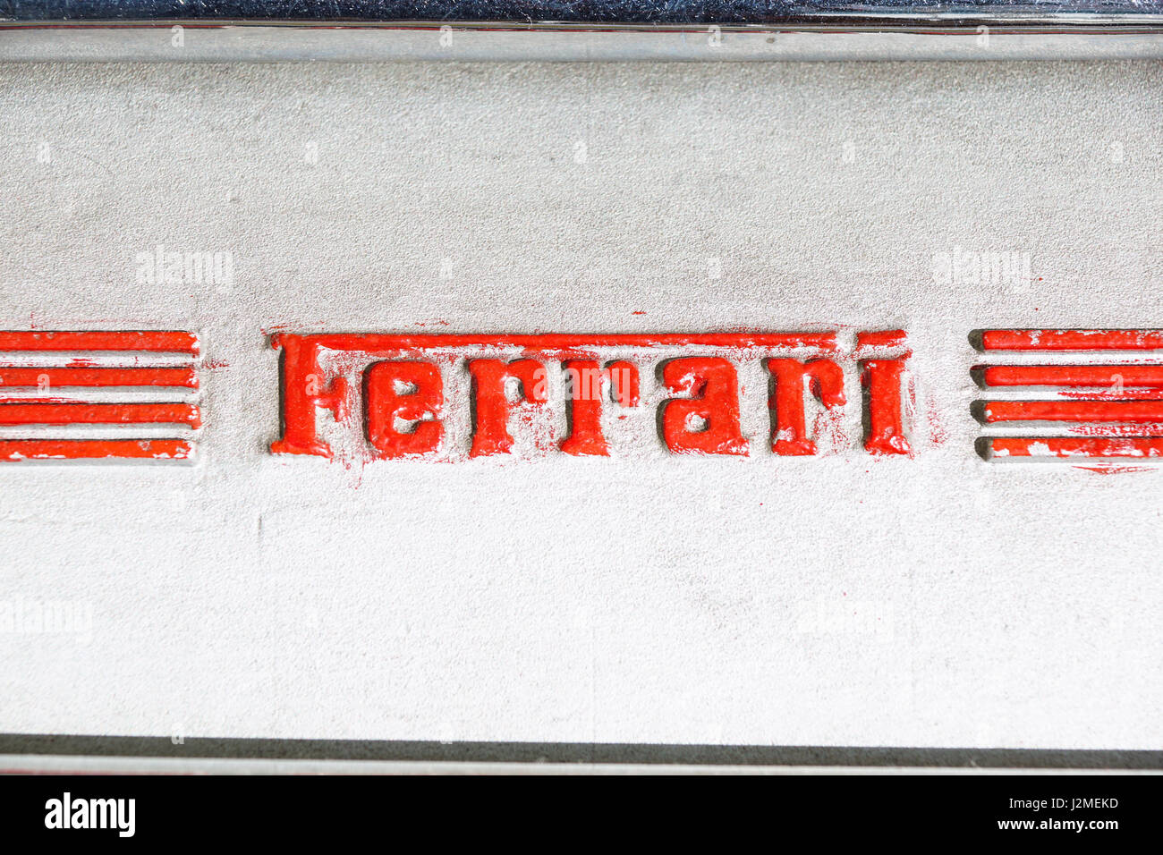 MODENA, ITALY - JULY 09: Logo Ferrari on motor of sport carat ...