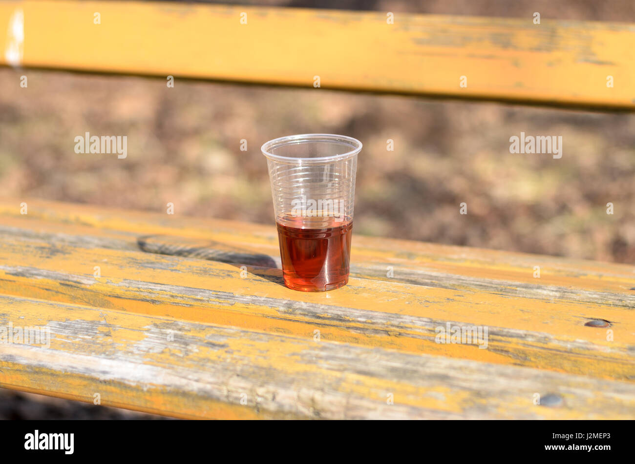 Alcohol drink park bench hi-res stock photography and images - Alamy