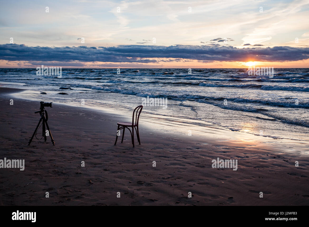 red chair on the beach in the morning. Long exposure shot. Latvia Stock ...