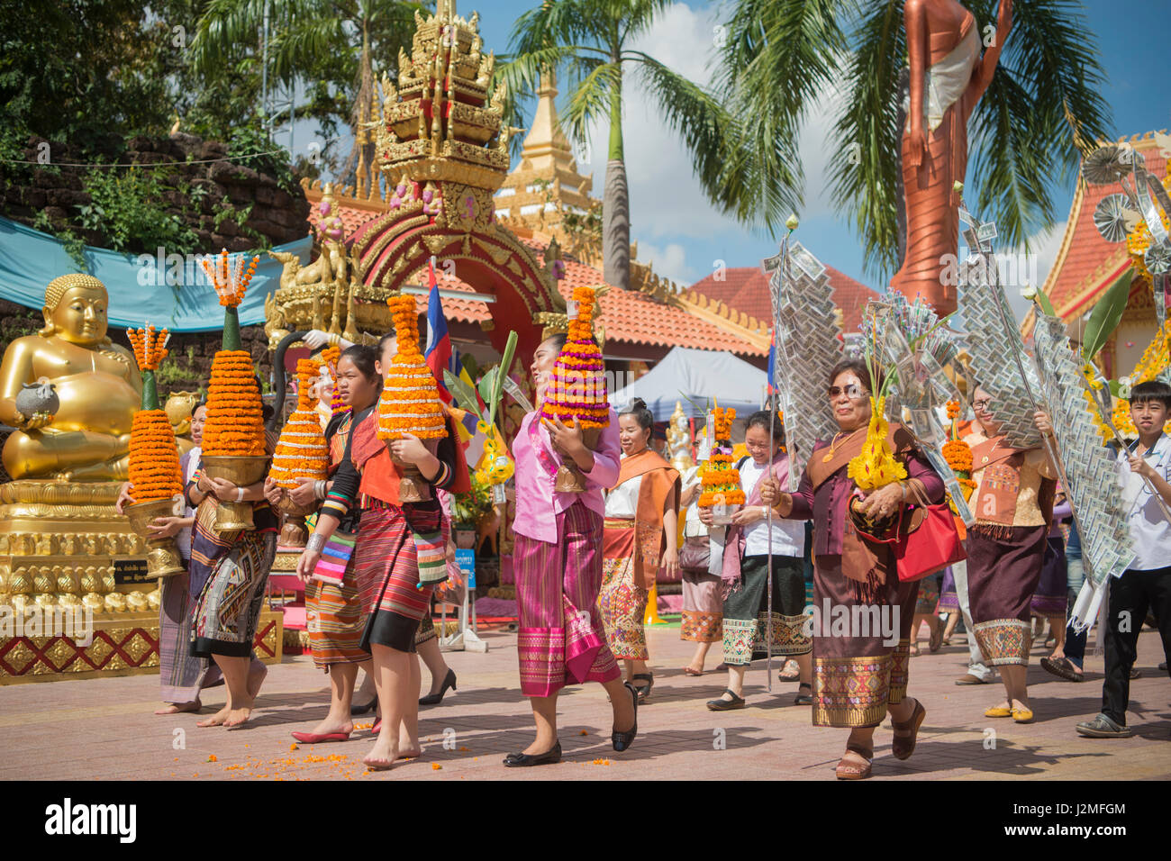 wax castle at a ceremony at the Wat Si Muang Temple on the That Luang ...