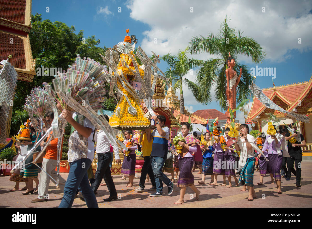 wax castle at a ceremony at the Wat Si Muang Temple on the That Luang ...