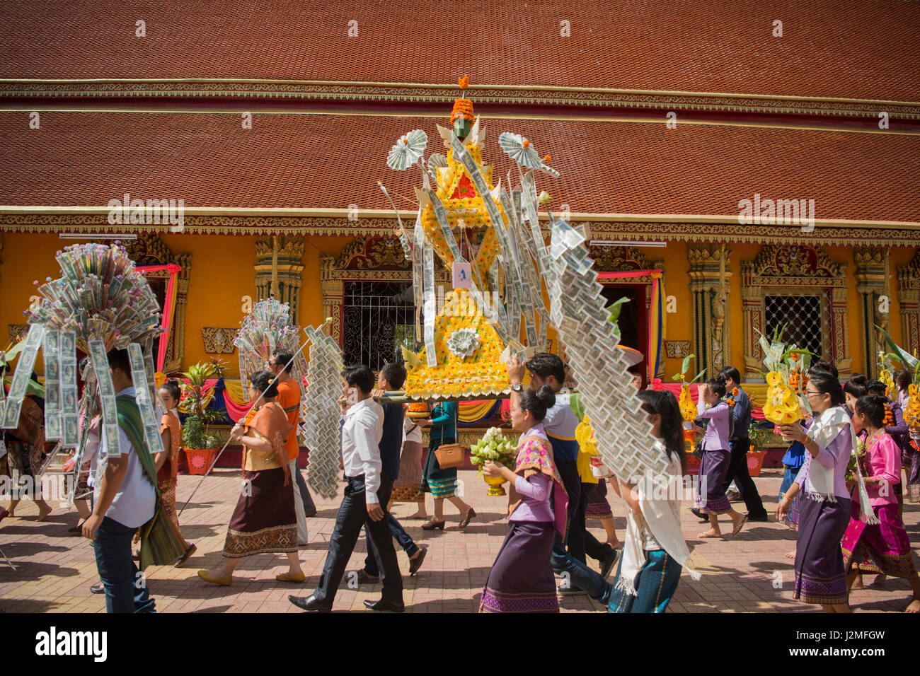wax castle at a ceremony at the Wat Si Muang Temple on the That Luang ...