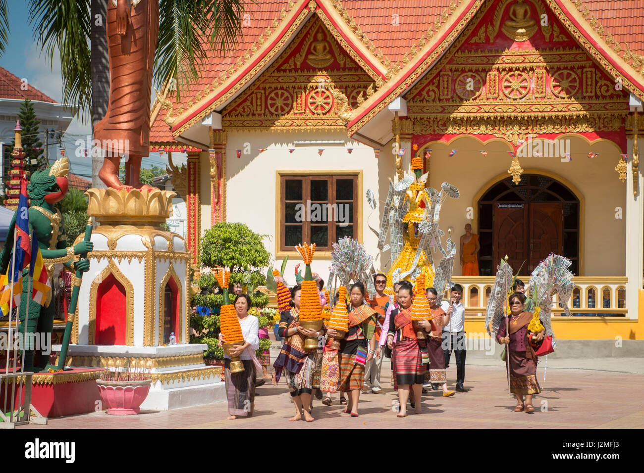 wax castle at a ceremony at the Wat Si Muang Temple on the That Luang ...