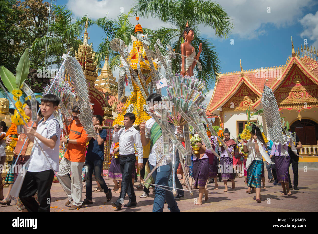 wax castle at a ceremony at the Wat Si Muang Temple on the That Luang ...