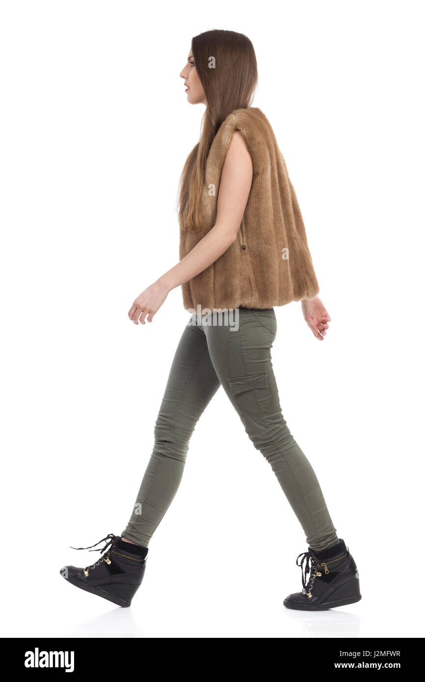 Side view woman walking boots hi-res stock photography and images - Alamy