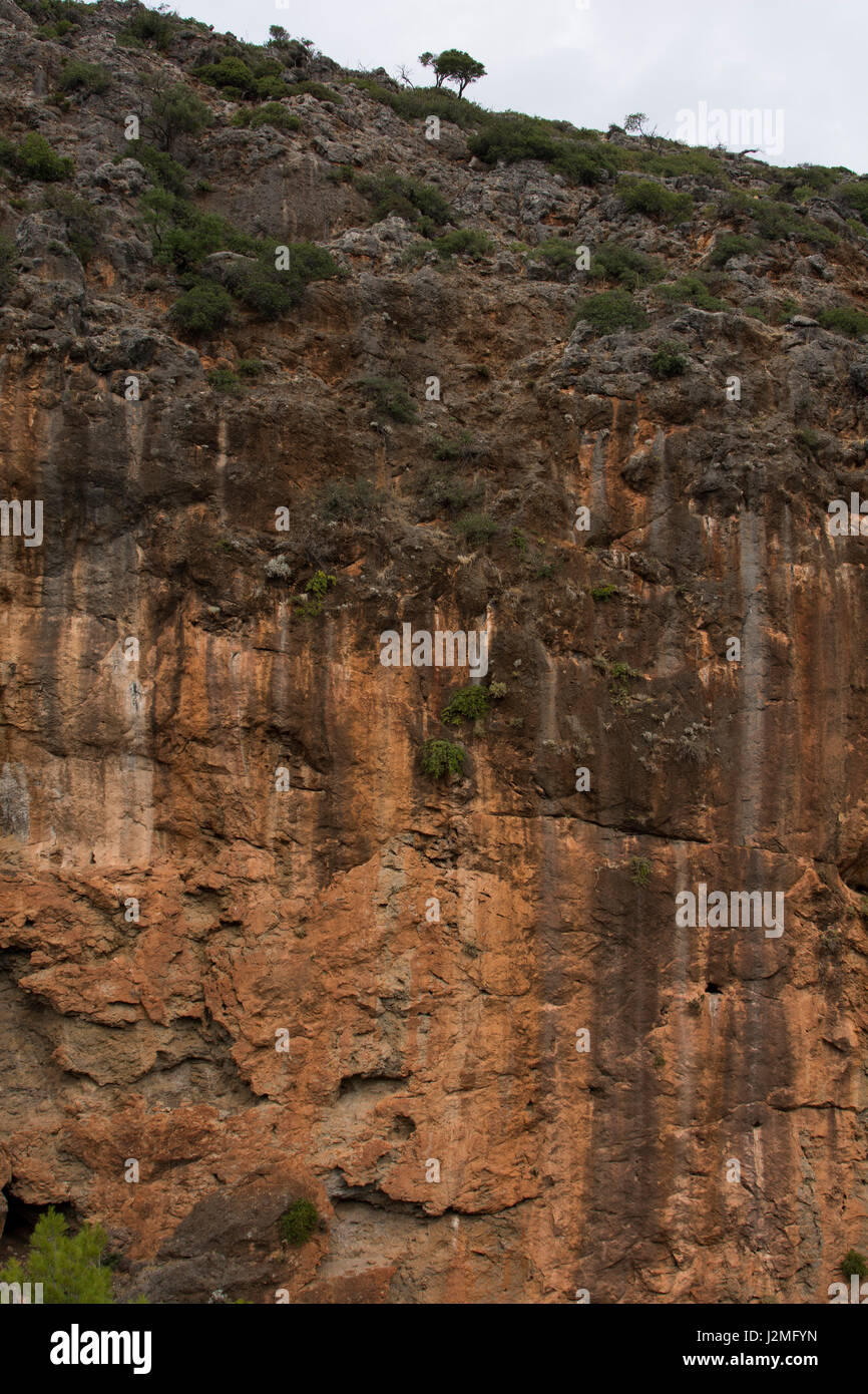 Lissos Gorge with its steep limestone walls at the Southwest coast of ...