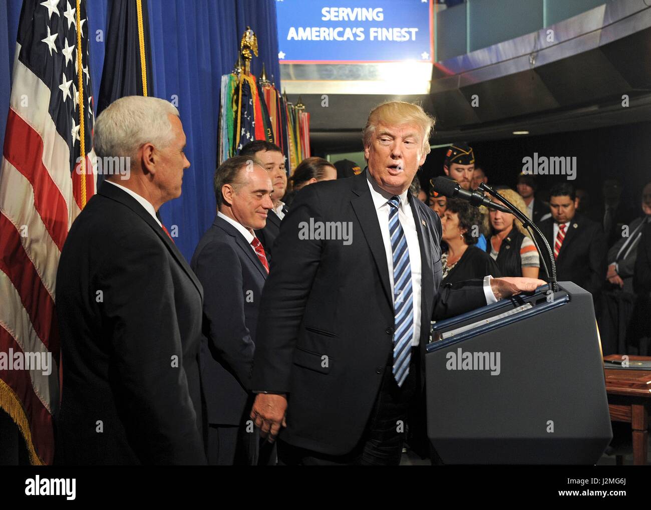U.S President Donald Trump along with Vice President Mike Pence, left ...