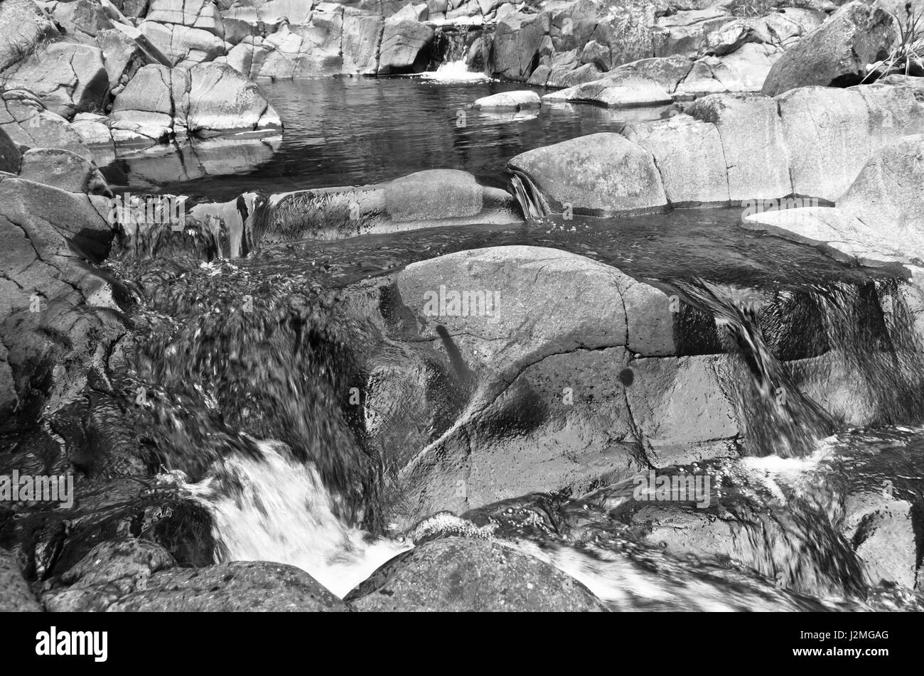 Detail of rocks in water at Black river gorge, west Serbia Stock Photo ...