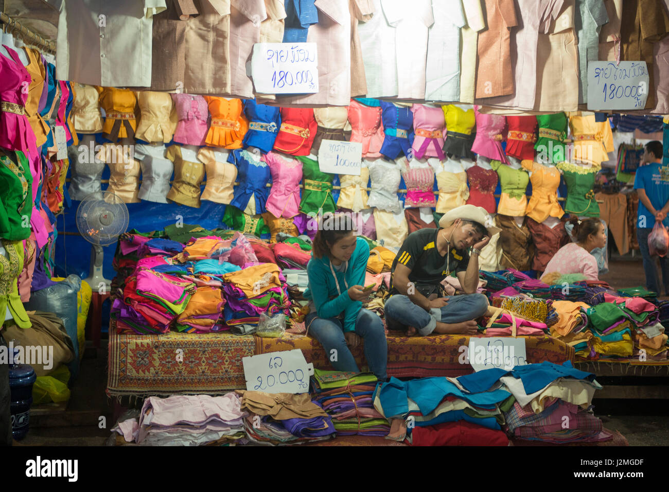 a clothes shop at the market at the Pha That Luang Festival in the city ...