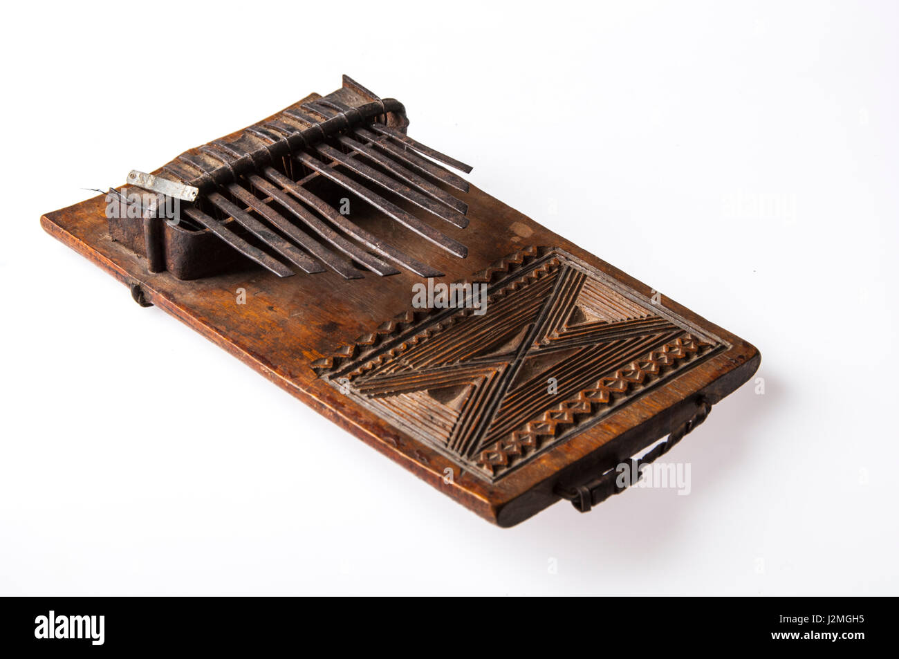 African handmade music instrument isolated on white background Stock ...