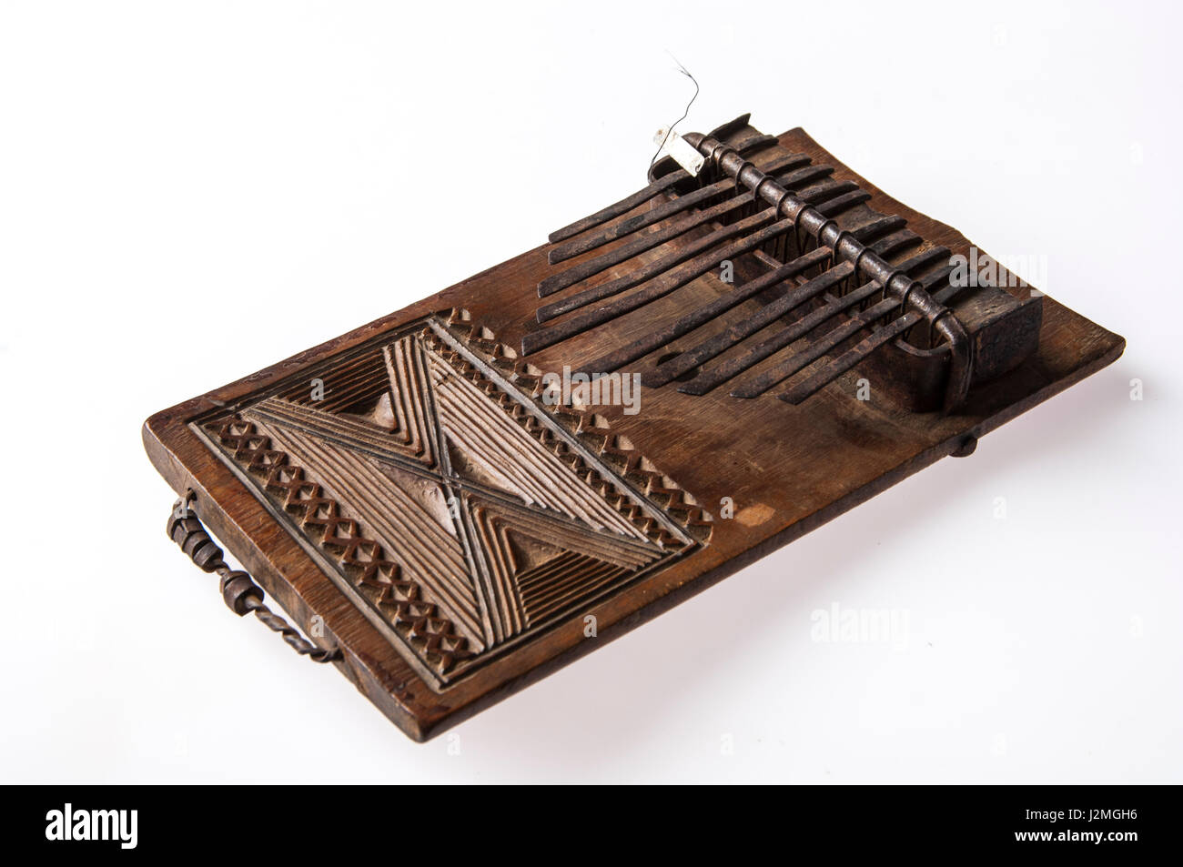 African handmade music instrument isolated on white background Stock ...