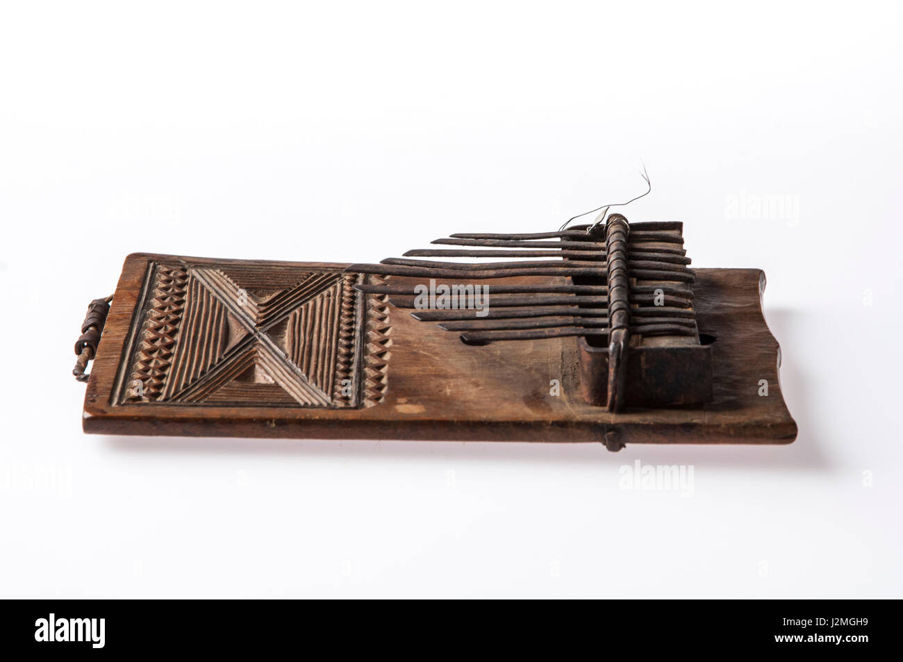 African handmade music instrument isolated on white background Stock ...