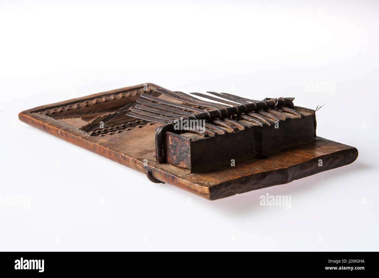 African handmade music instrument isolated on white background Stock ...