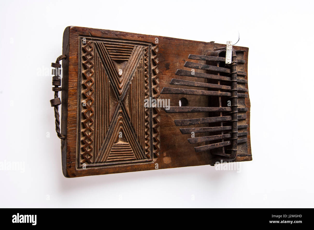 African handmade music instrument isolated on white background Stock ...