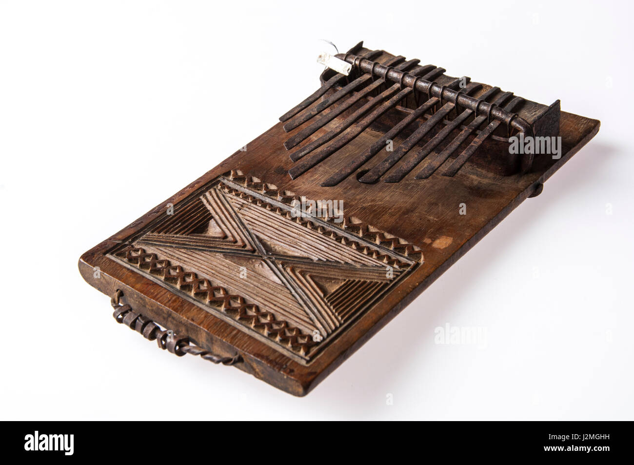 African handmade music instrument isolated on white background Stock ...