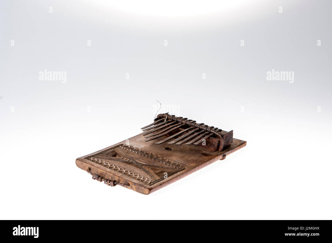 African handmade music instrument isolated on white background Stock ...