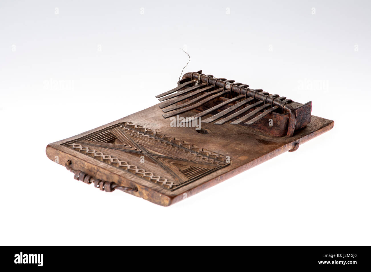 African handmade music instrument isolated on white background Stock ...