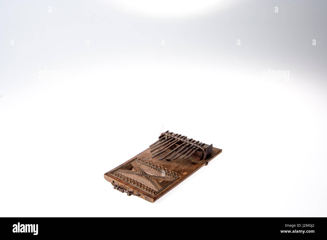 African handmade music instrument isolated on white background Stock ...