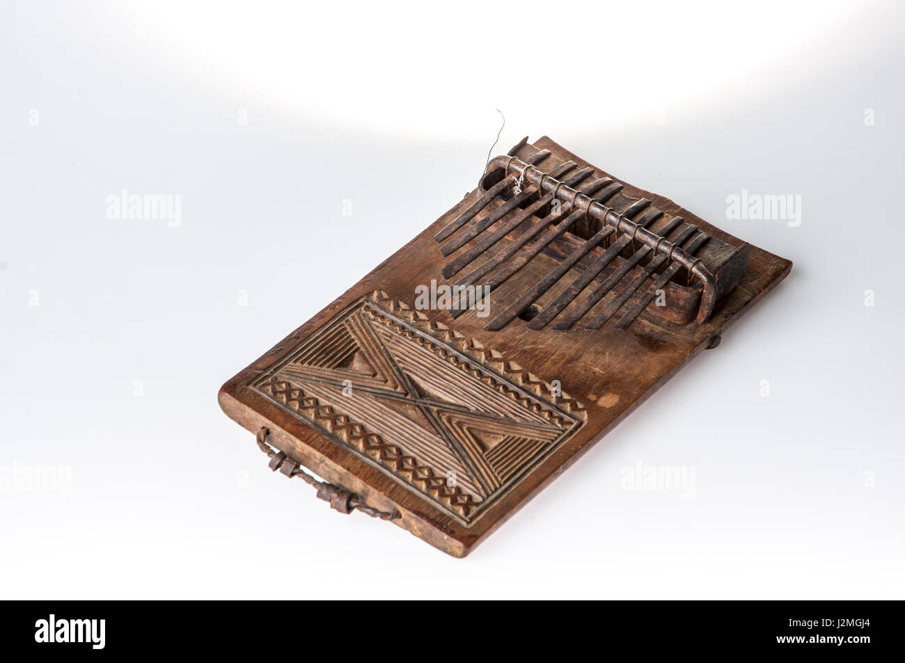 African handmade music instrument isolated on white background Stock ...