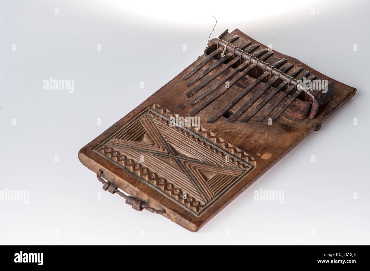 African handmade music instrument isolated on white background Stock ...