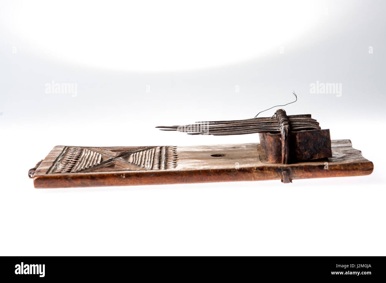 African handmade music instrument isolated on white background Stock ...