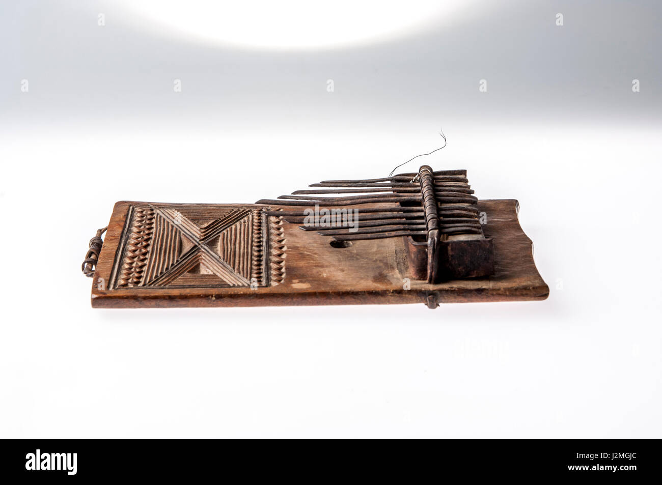 African handmade music instrument isolated on white background Stock ...