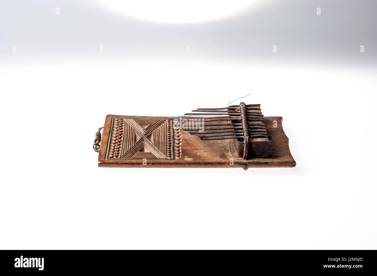 African handmade music instrument isolated on white background Stock ...