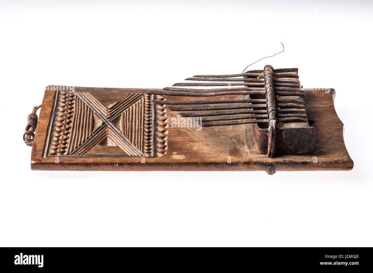 African handmade music instrument isolated on white background Stock ...