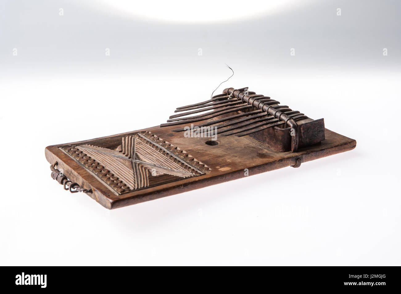 African handmade music instrument isolated on white background Stock ...