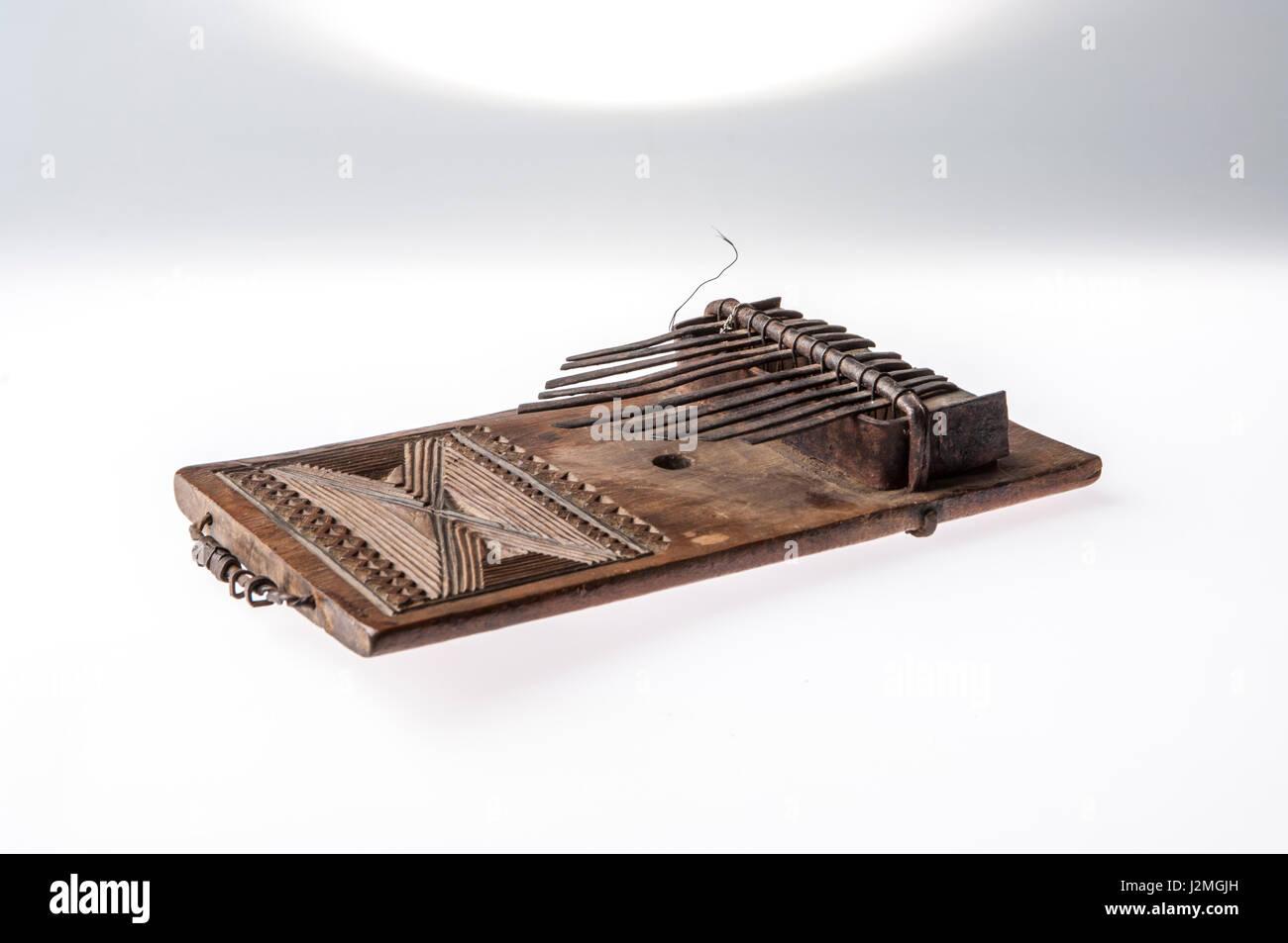 African handmade music instrument isolated on white background Stock ...