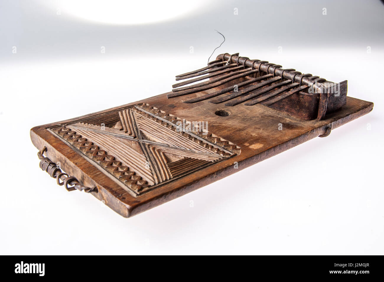 African handmade music instrument isolated on white background Stock ...