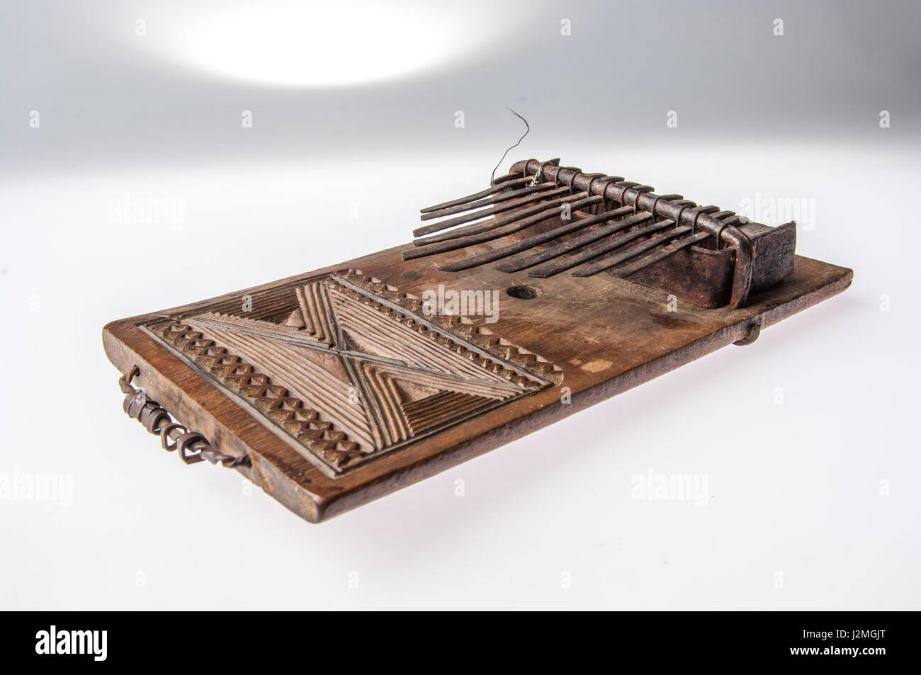 African handmade music instrument isolated on white background Stock ...
